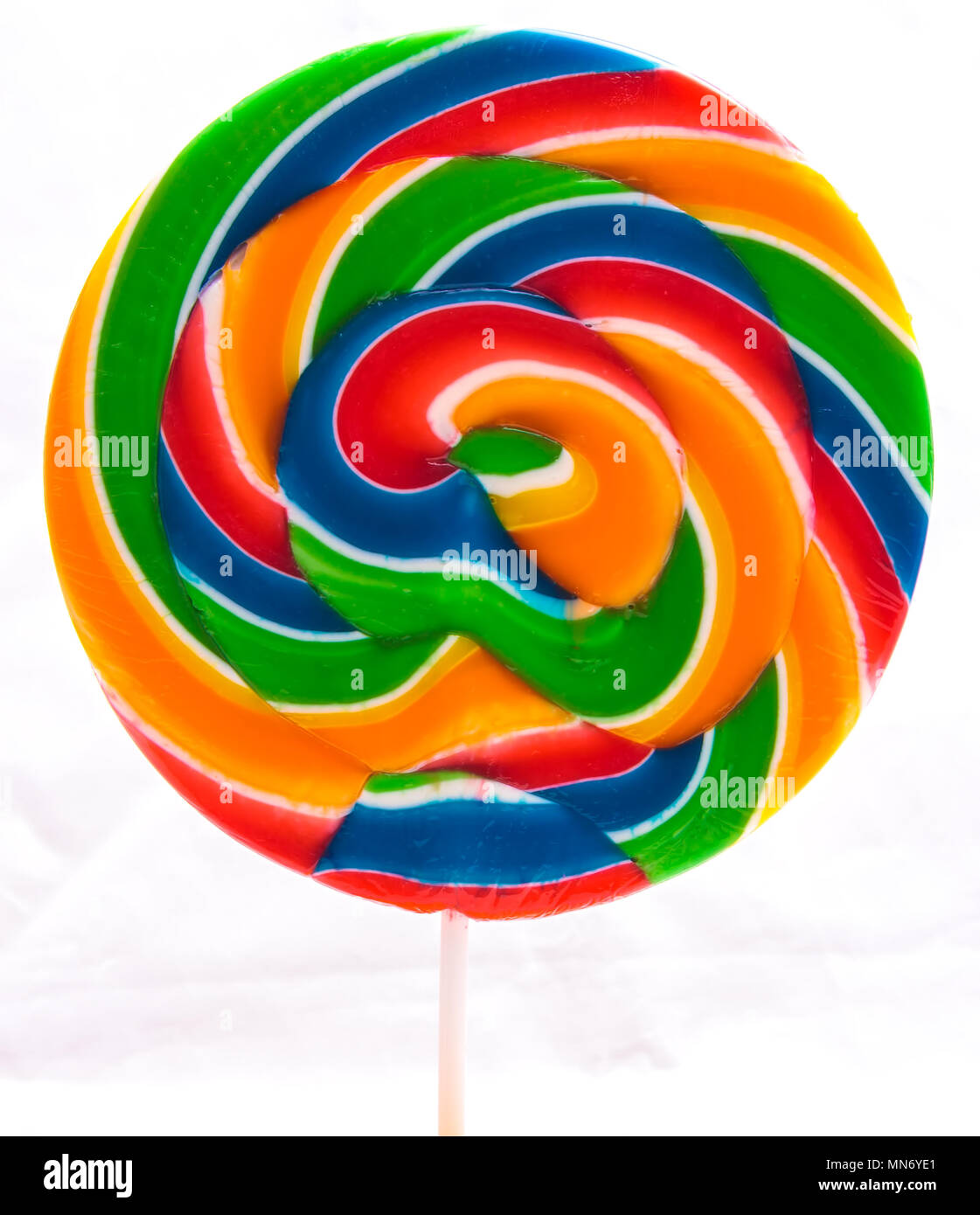A round multi-colored Lollipop Against a White Background Stock Photo ...