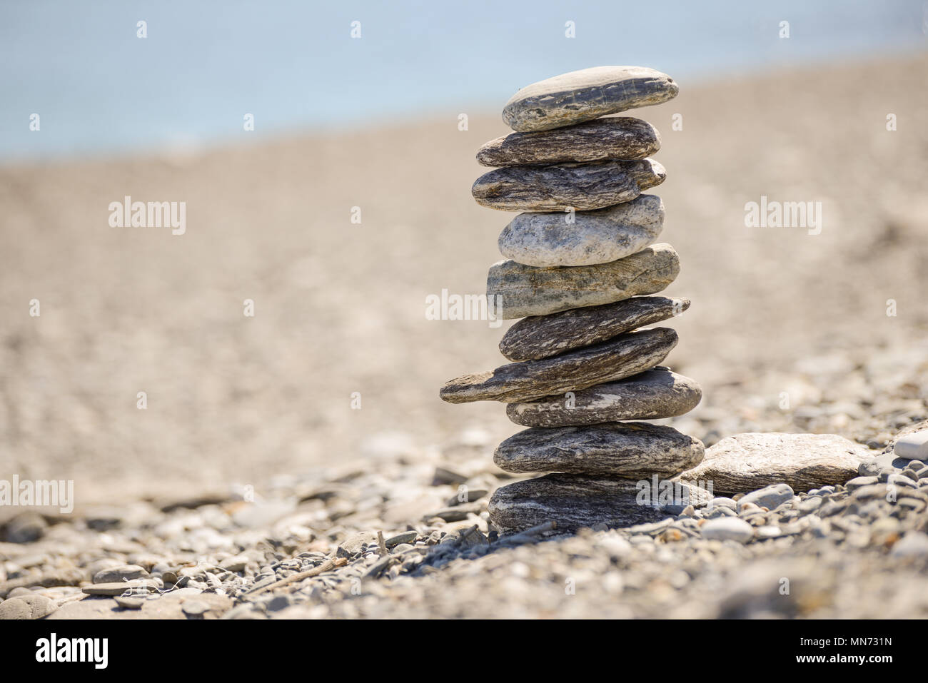 Pebbles in small beach vertical hi-res stock photography and images - Alamy