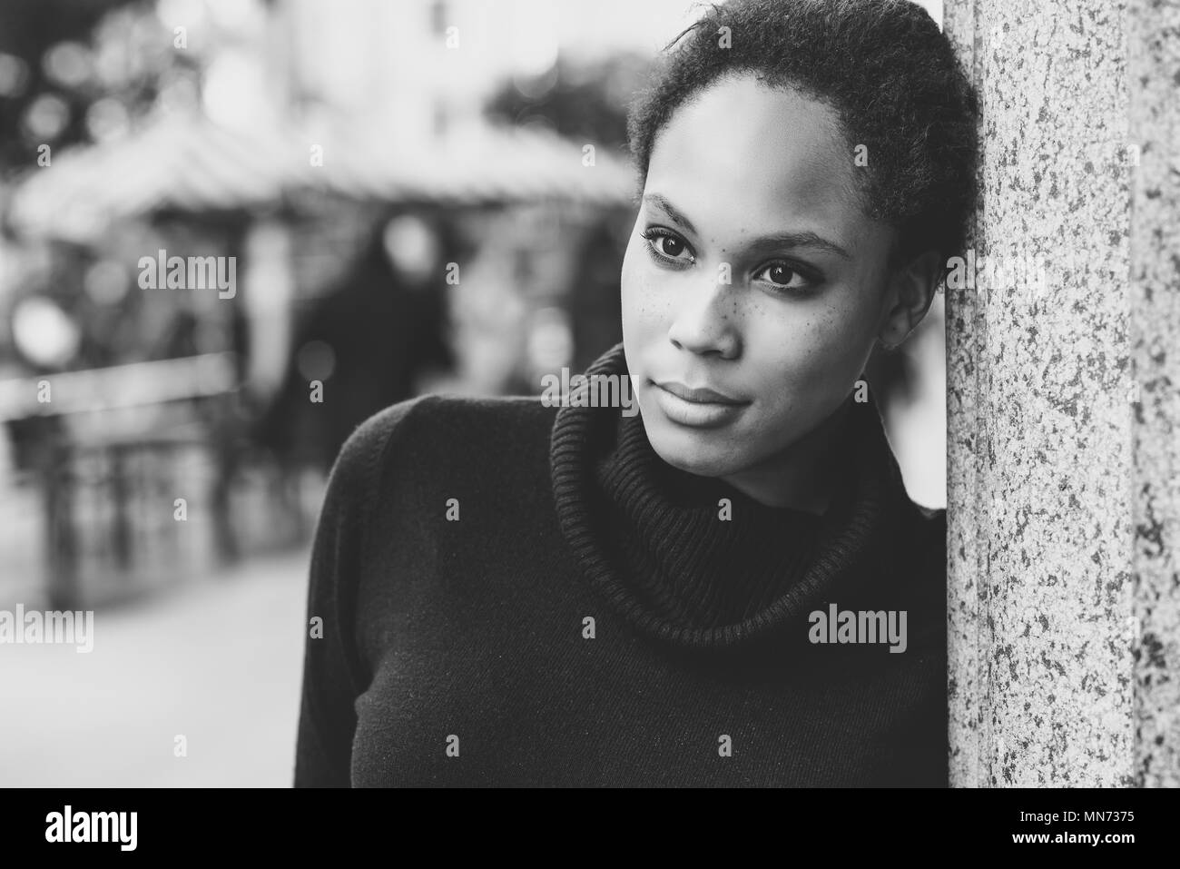 Woman wearing turtleneck sweater Black and White Stock Photos & Images ...