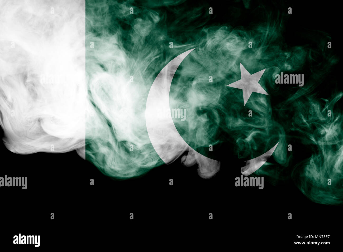 National flag of Pakistan from thick colored smoke on a black isolated ...
