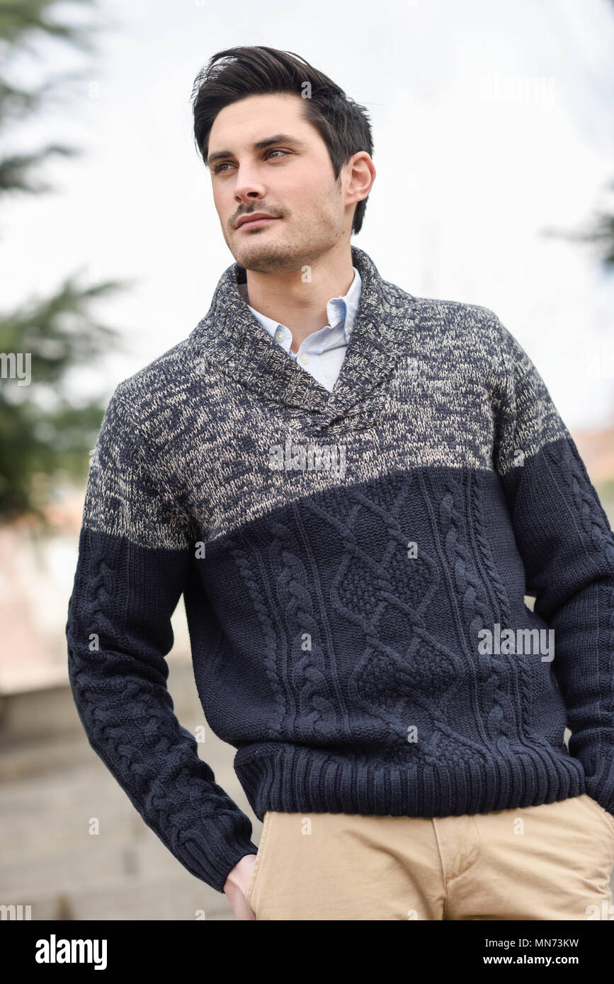 Portrait of a young handsome man, model of fashion, with modern ...