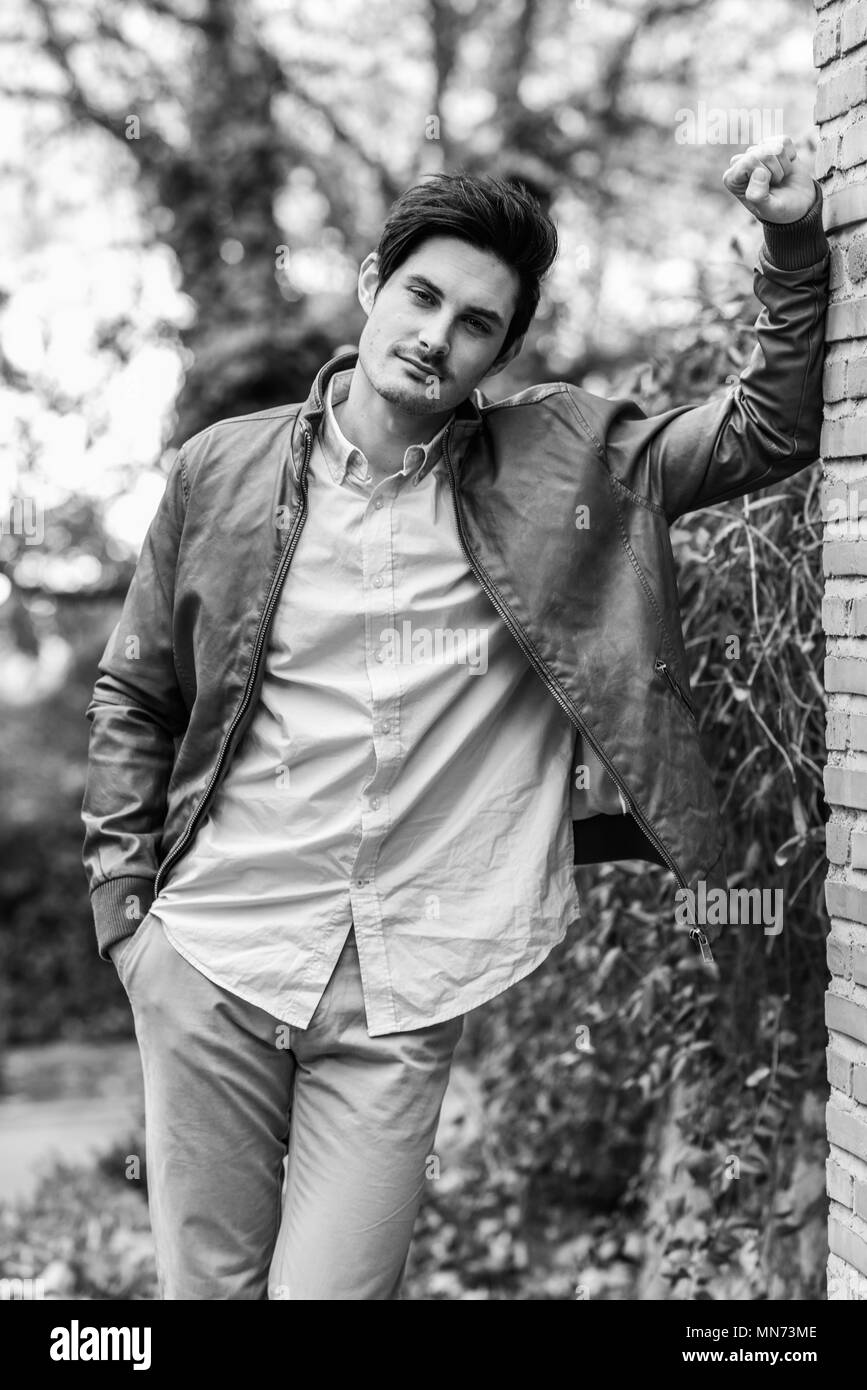 Portrait of a young handsome man, model of fashion, with modern ...