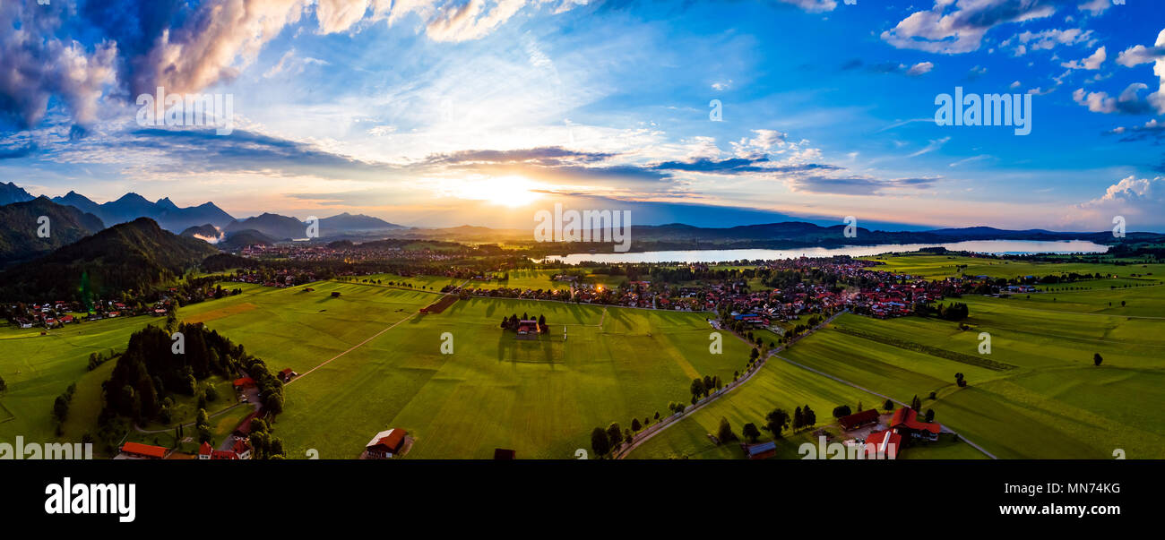 Panorama from the air sunset Forggensee and Schwangau, Germany, Bavaria ...