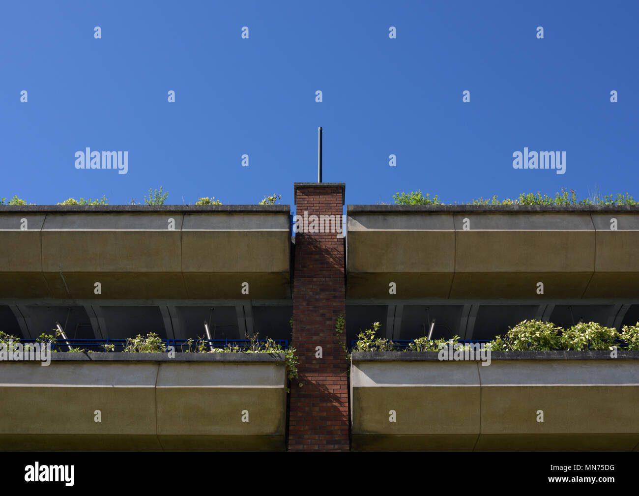 Multi storey car park with planters showing two storeys in spring ...