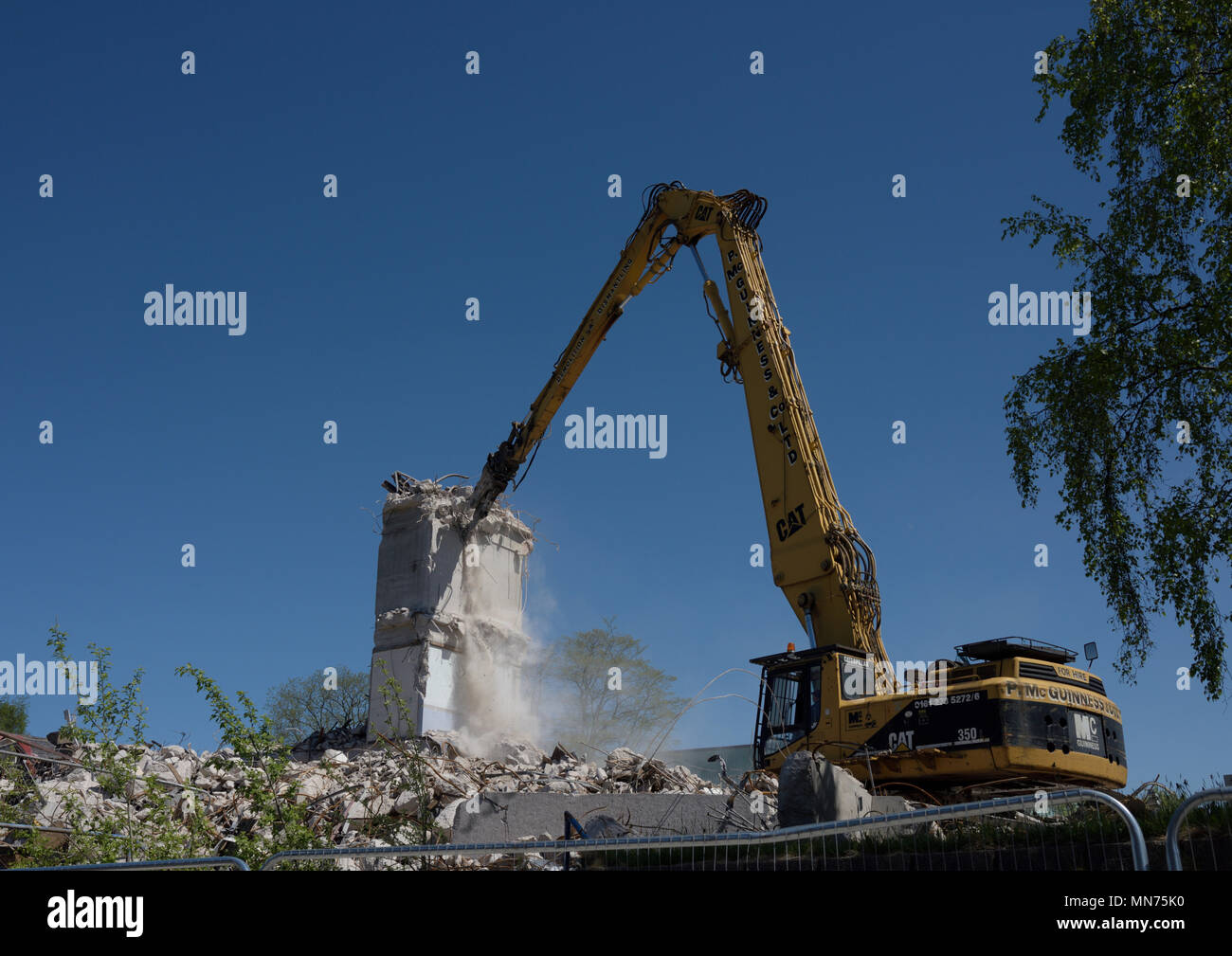 Controlled demolition of multi storey reinforced concrete building ...