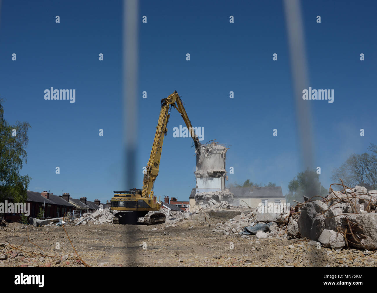 Controlled demolition of multi storey reinforced concrete building ...