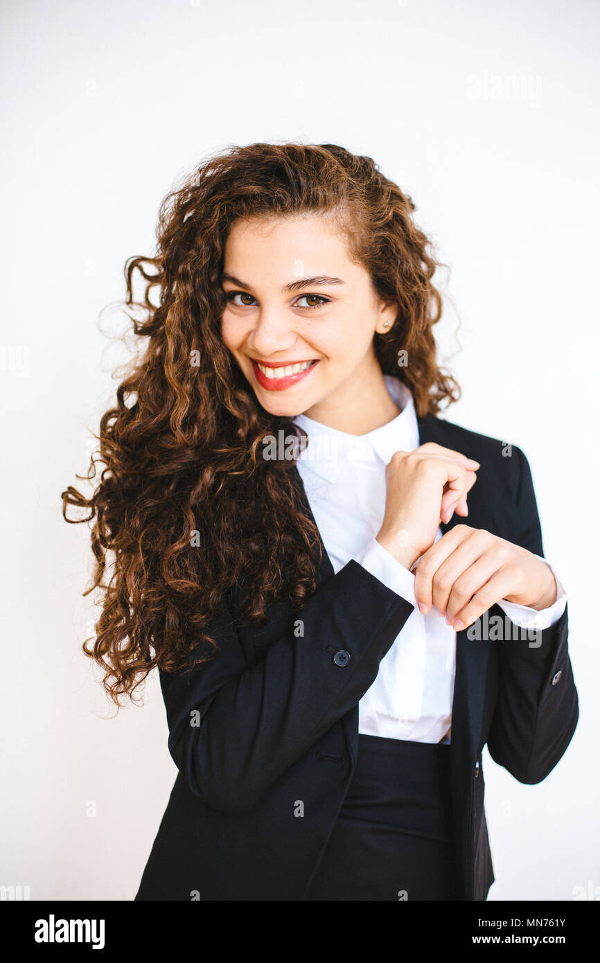 Young businesswoman getting dressed hi-res stock photography and images ...
