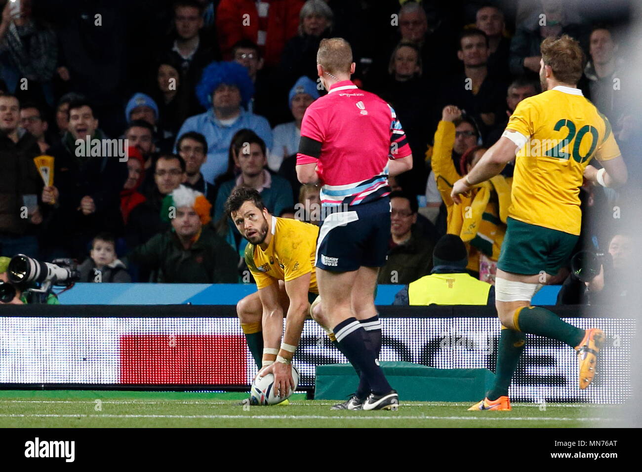 Adam Ashley-Cooper runs in a fourth try for Australia during the IRB ...