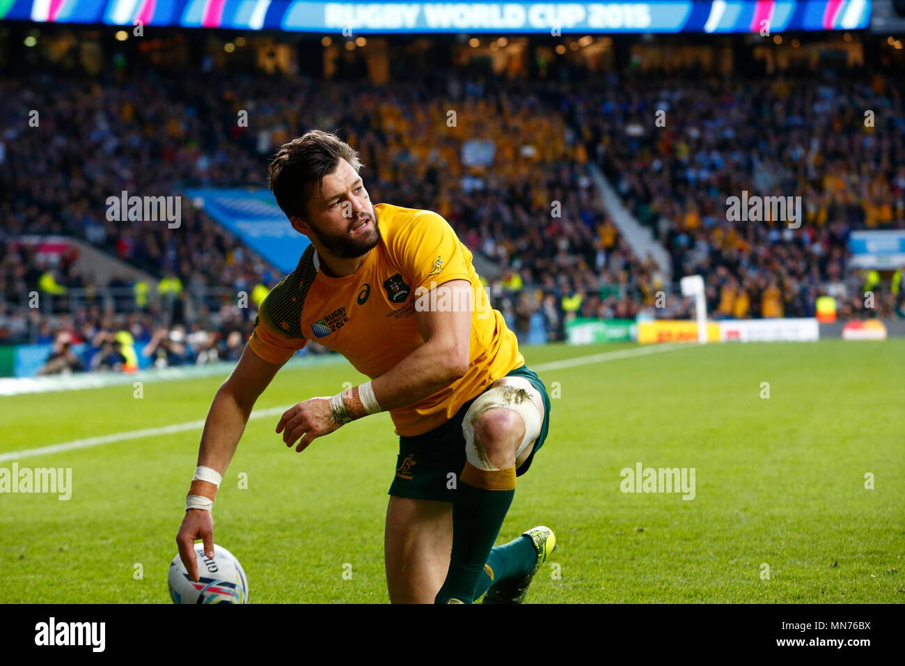 Adam Ashley-Cooper runs in a third try for Australia during the IRB RWC ...