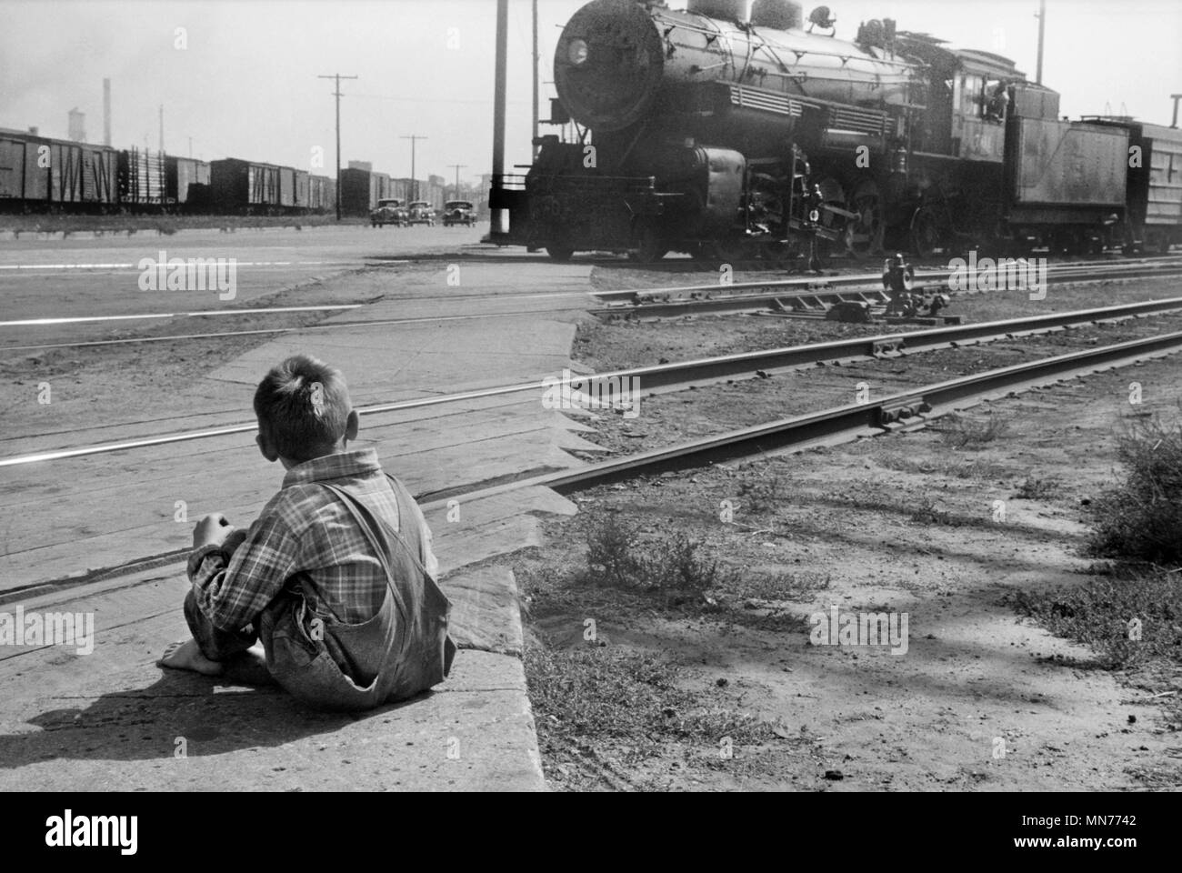 Rear View of Young Boy Watching Freight Train go by, Minneapolis ...