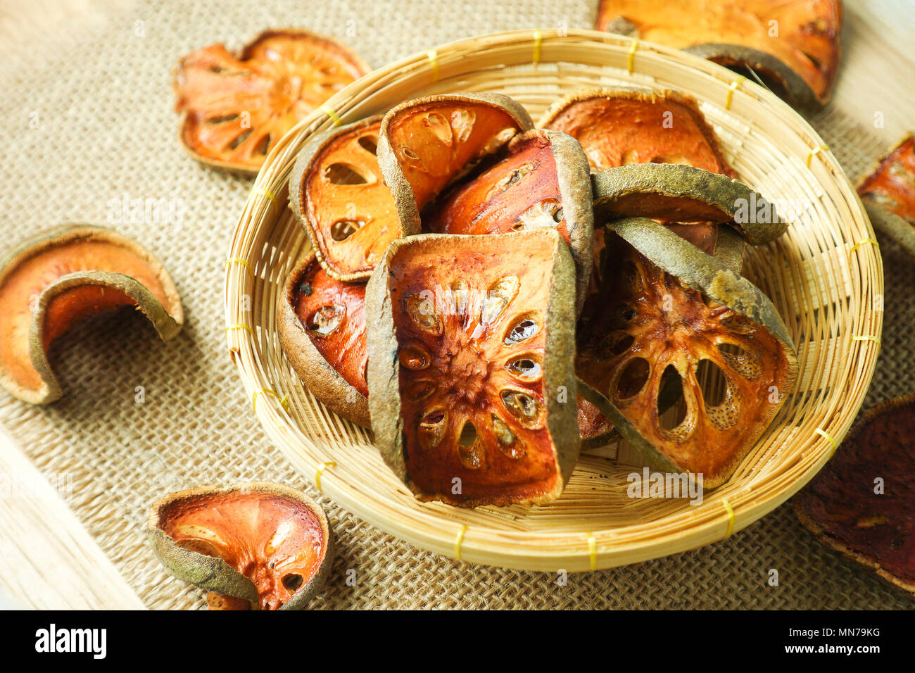 slices of dry bael fruit in basket, close-up Stock Photo - Alamy