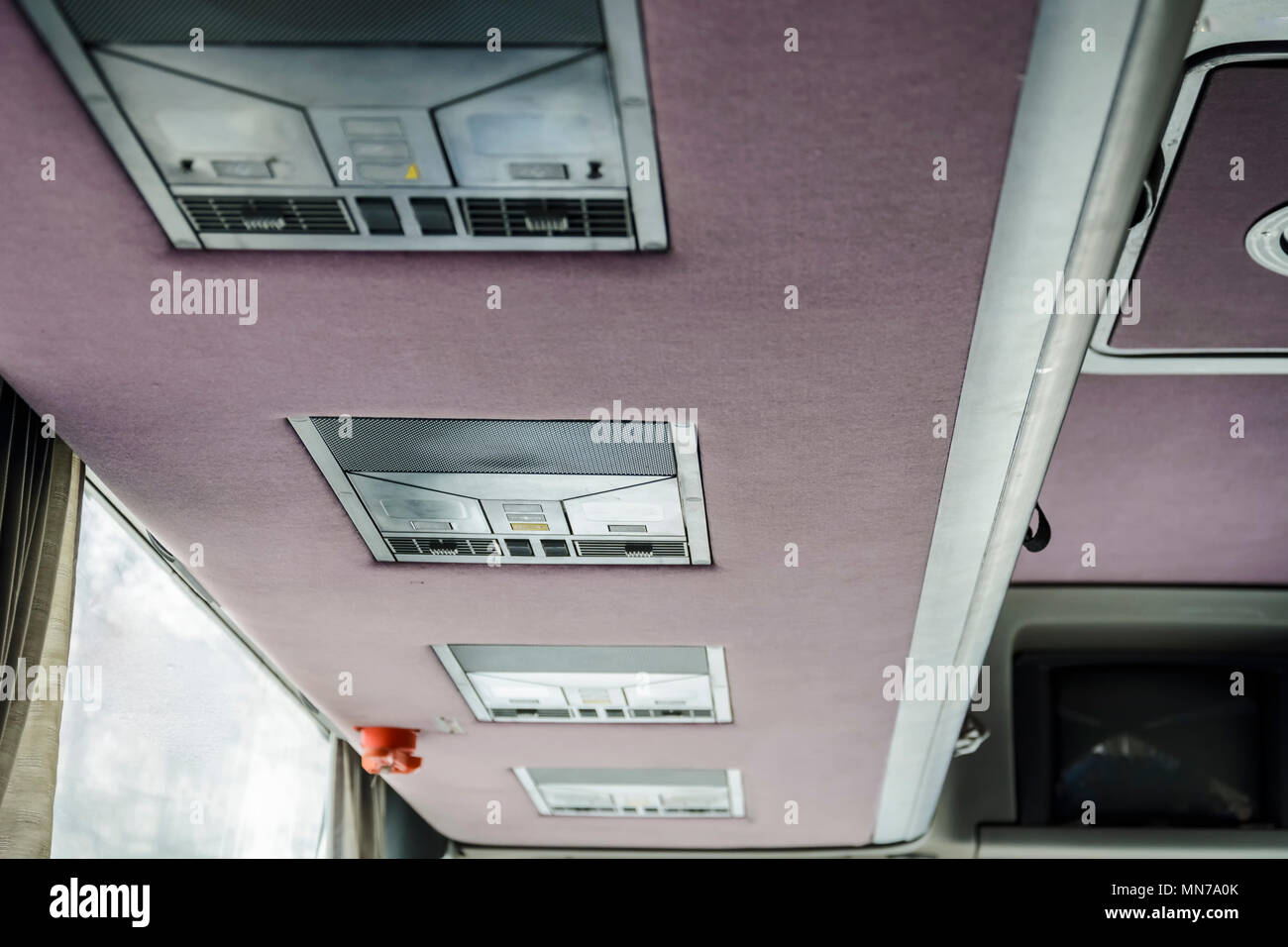 Air conditioning and light panel in a traveling bus Stock Photo - Alamy
