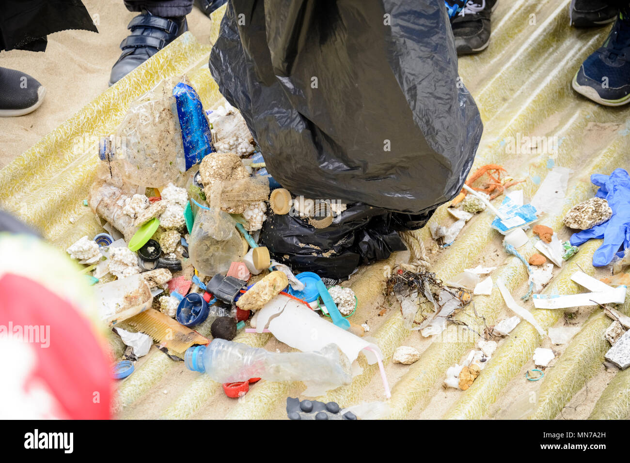 Cleaning beach from rubbish plastic hi-res stock photography and images ...