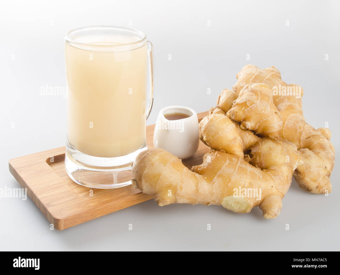 Ginger tea or Ginger tea with haney on background Stock Photo - Alamy