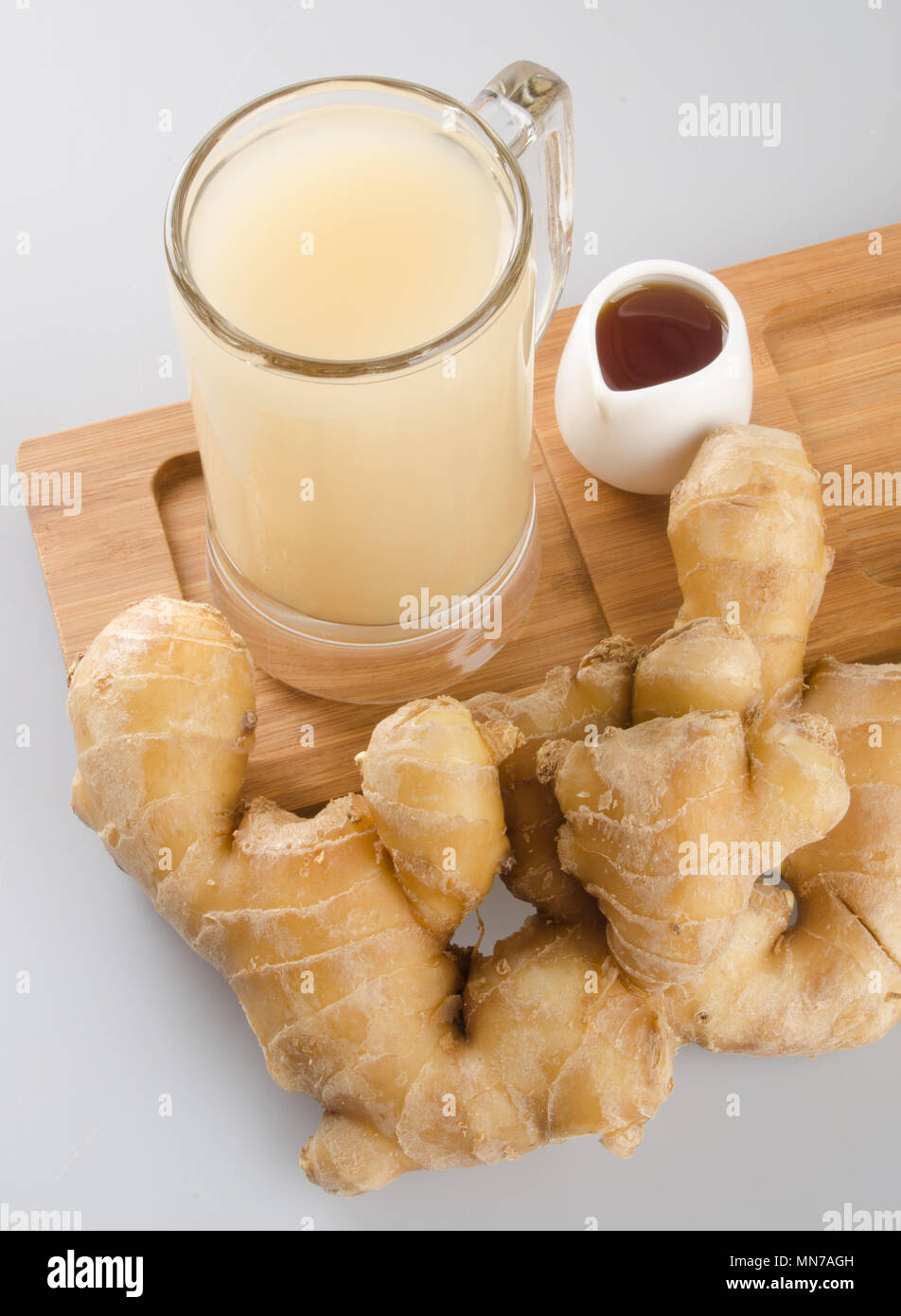 Ginger tea or Ginger tea with haney on background Stock Photo - Alamy