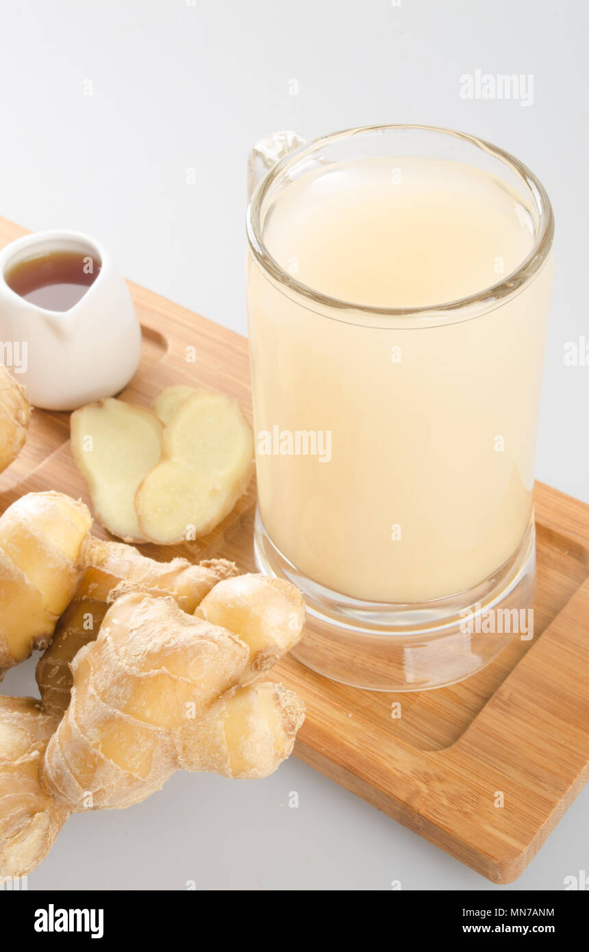 Ginger tea or Ginger tea with haney on background Stock Photo - Alamy