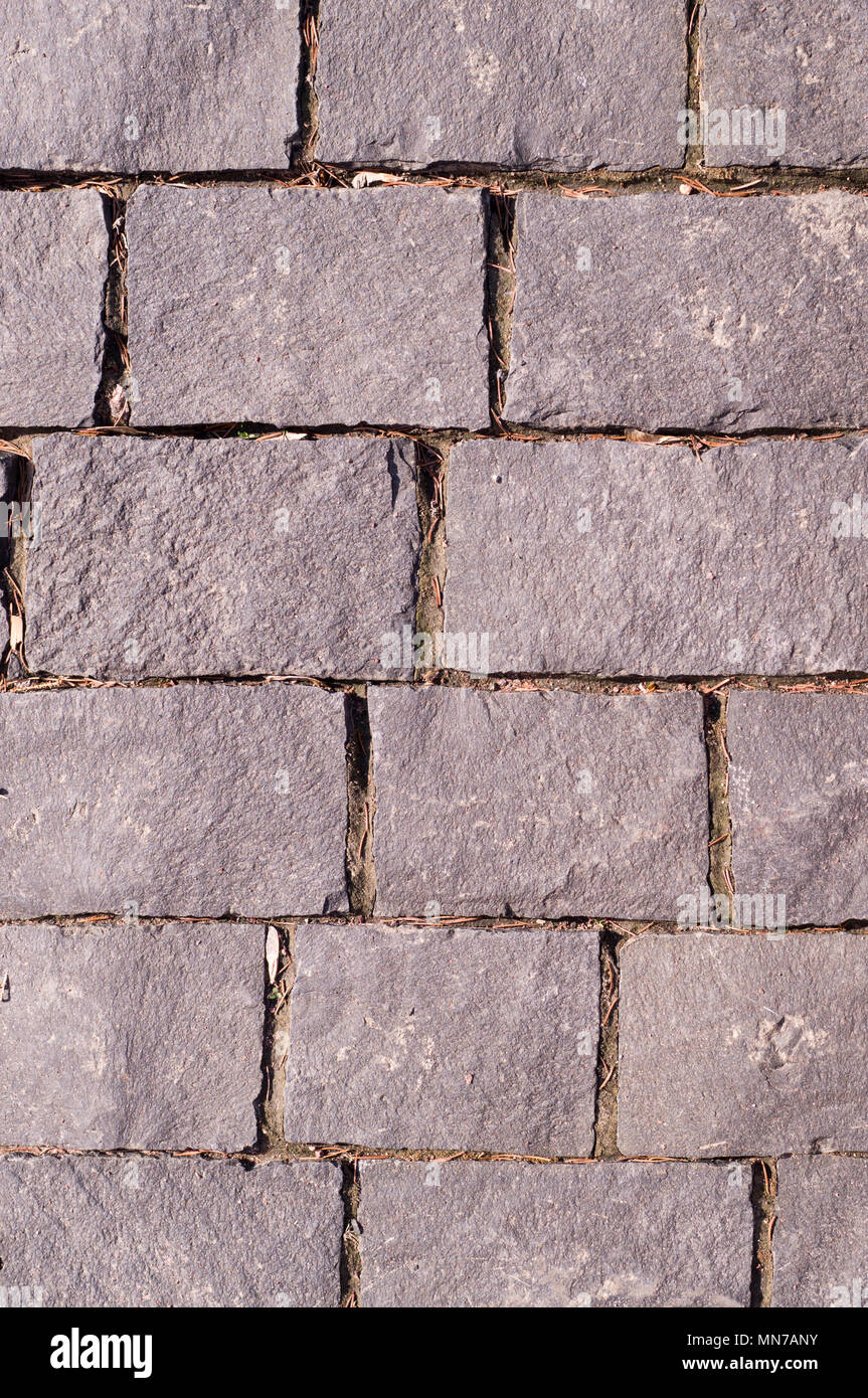 old granite paved sidewalk road. background, texture Stock Photo - Alamy