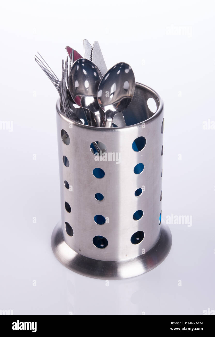 Kitchen utensils holder on the background Stock Photo - Alamy
