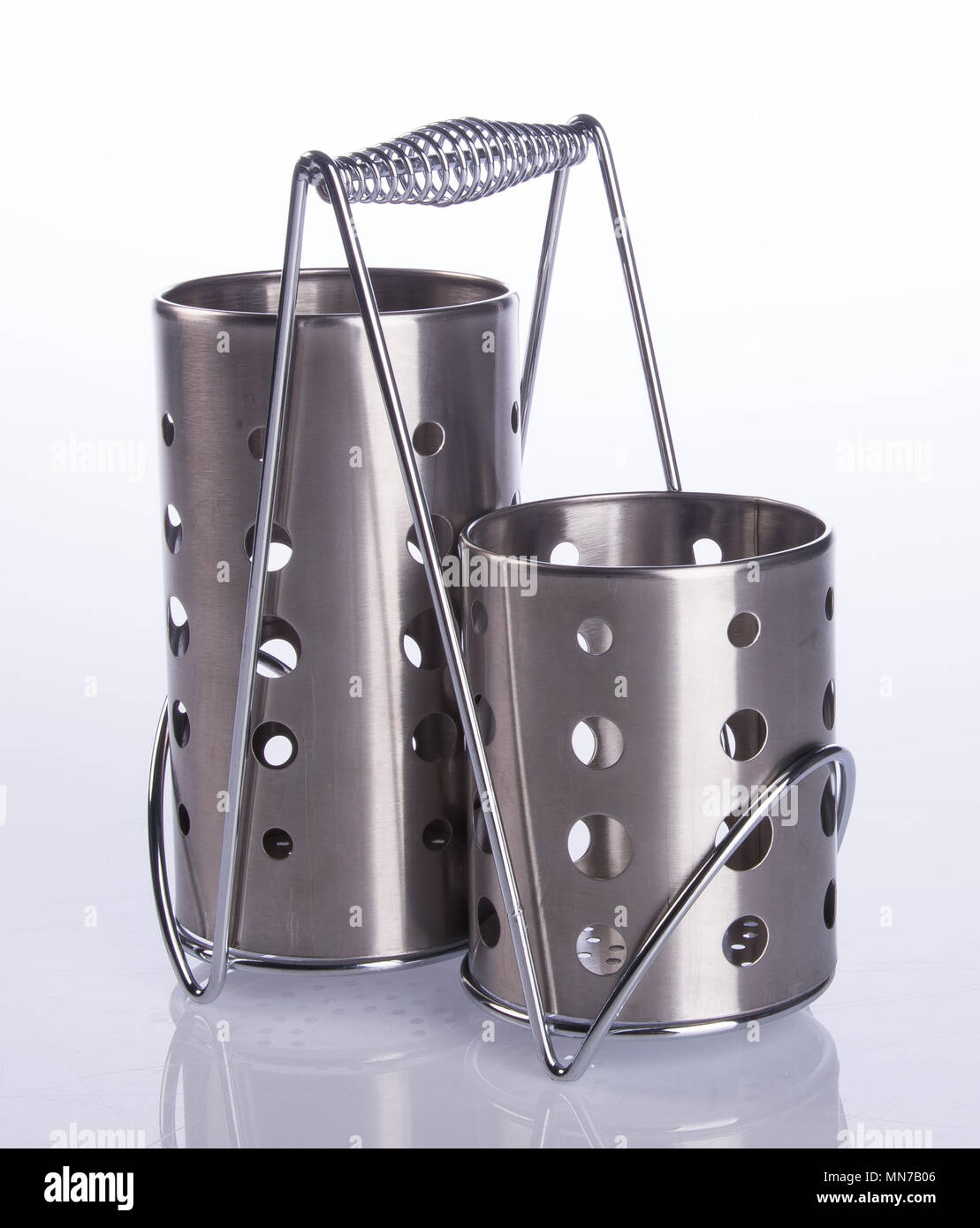 Kitchen utensils holder on the background Stock Photo - Alamy
