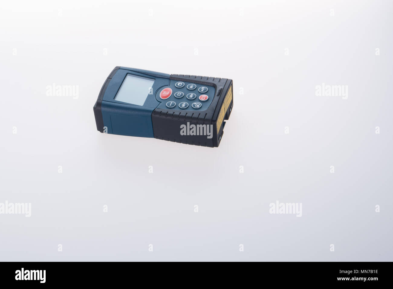Architectural tool or laser rangefinder on a background Stock Photo - Alamy