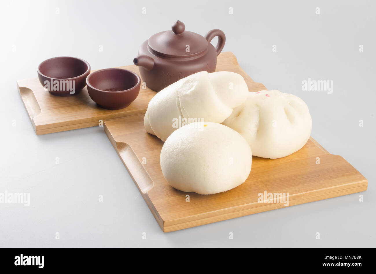 pao or mantou chinese steamed bun on a background Stock Photo - Alamy