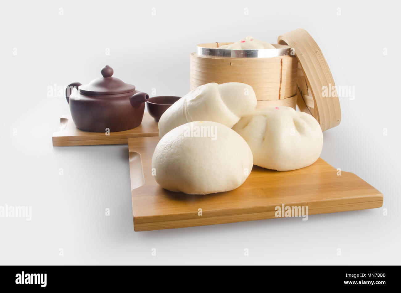 pao or mantou chinese steamed bun on a background Stock Photo - Alamy