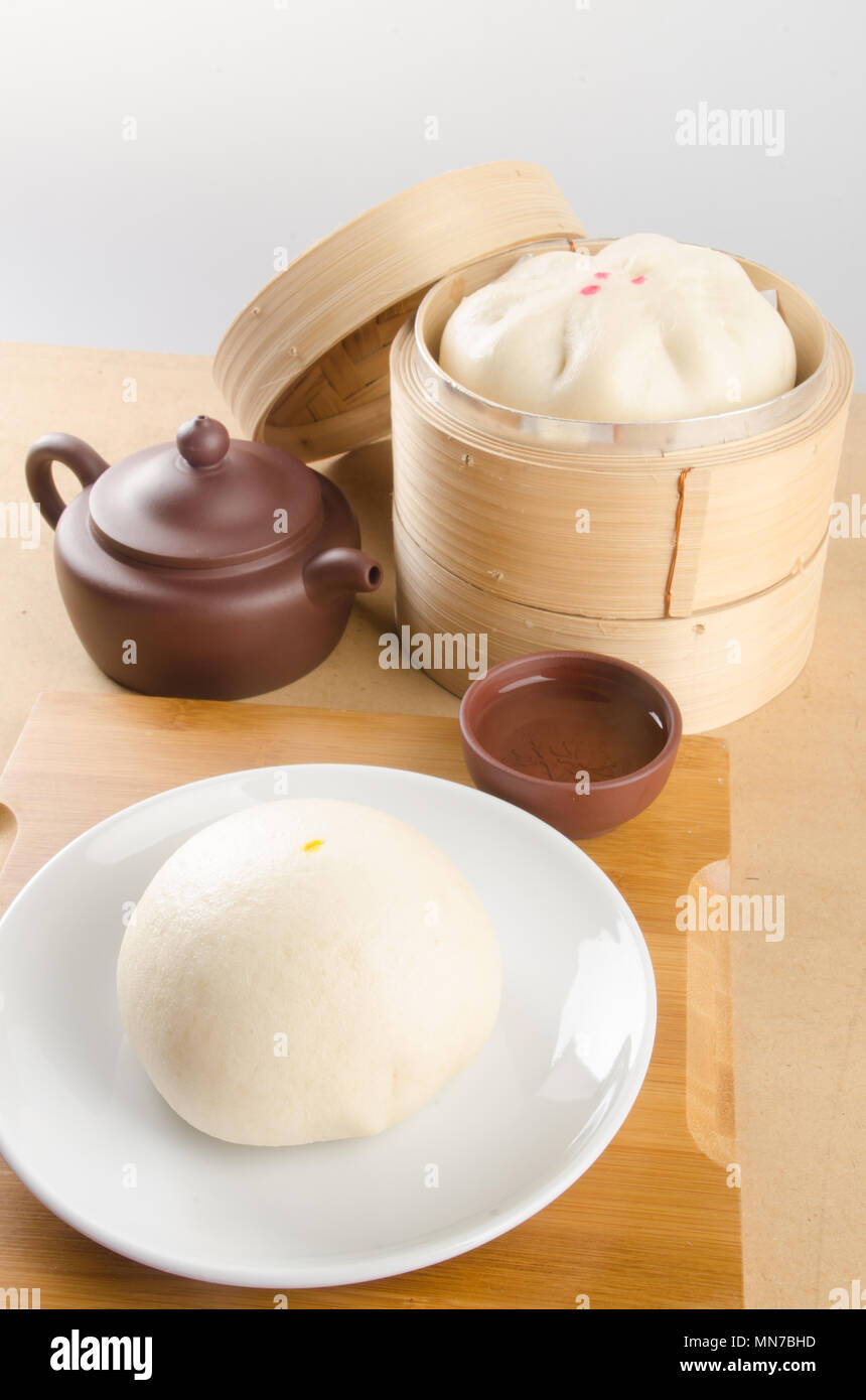 pao or mantou chinese steamed bun on a background Stock Photo - Alamy