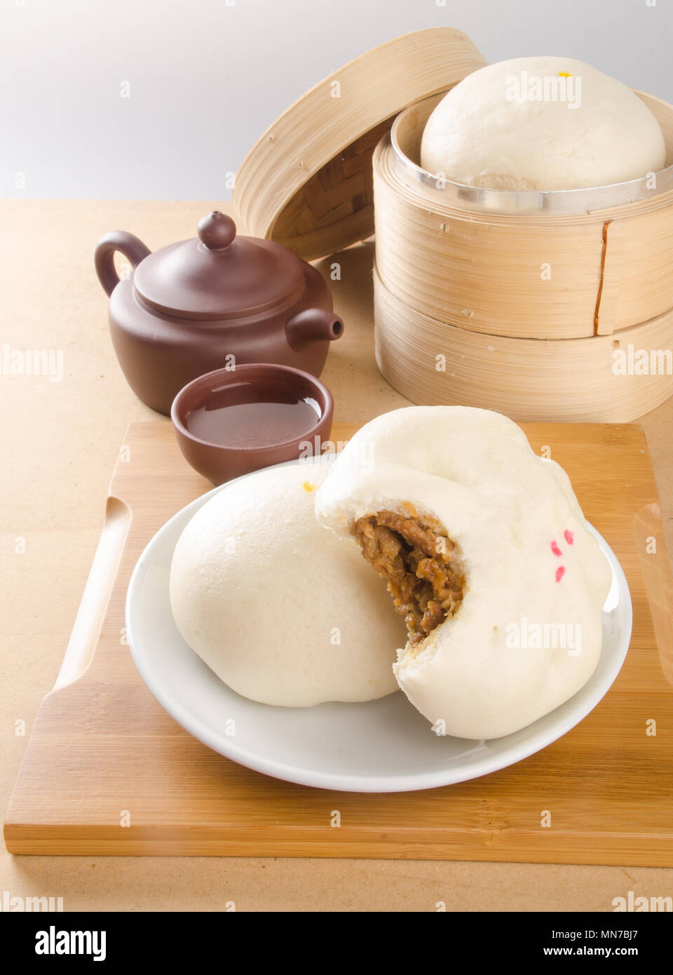 pao and chinese tea on a background Stock Photo - Alamy
