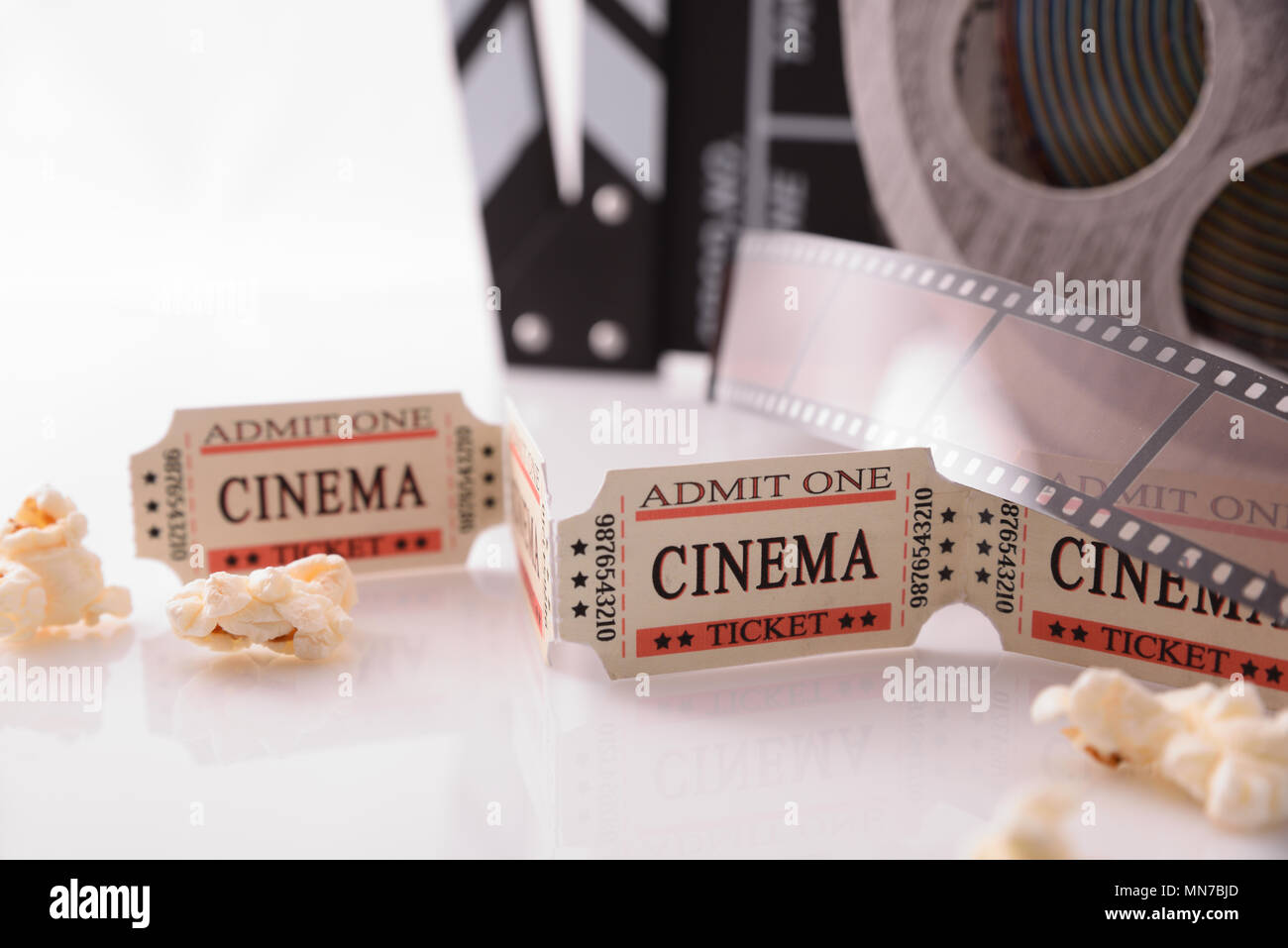 Conceptual objects of cinema on white table and background close up ...