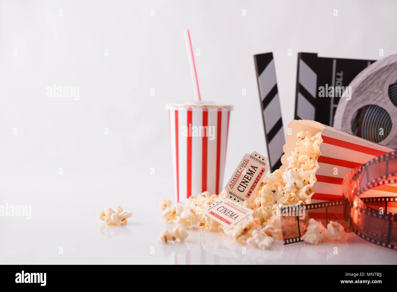 Conceptual objects of cinema on white table and background. Concept of ...