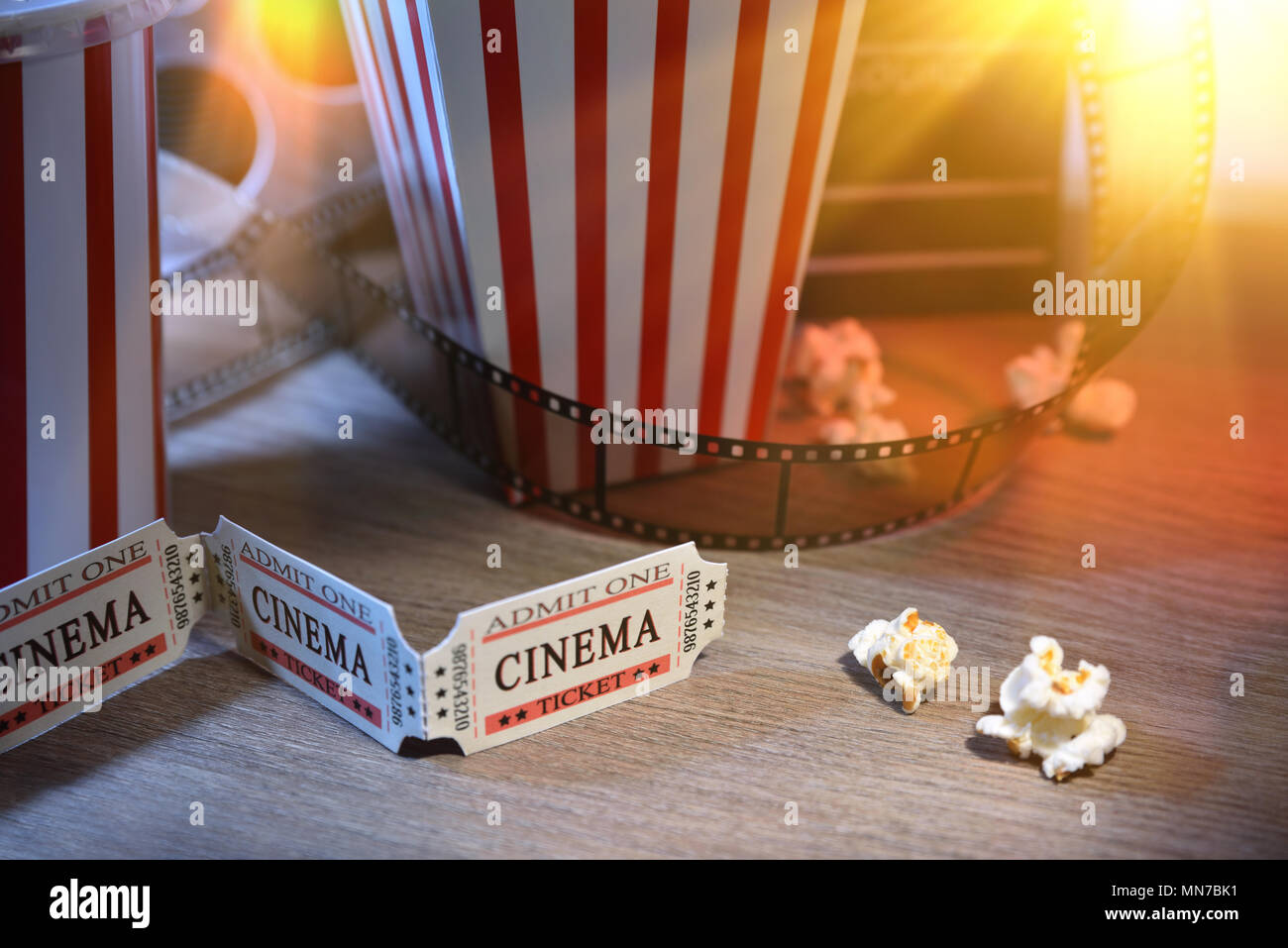 Equipment and elements of cinema on wooden table and background cinema ...