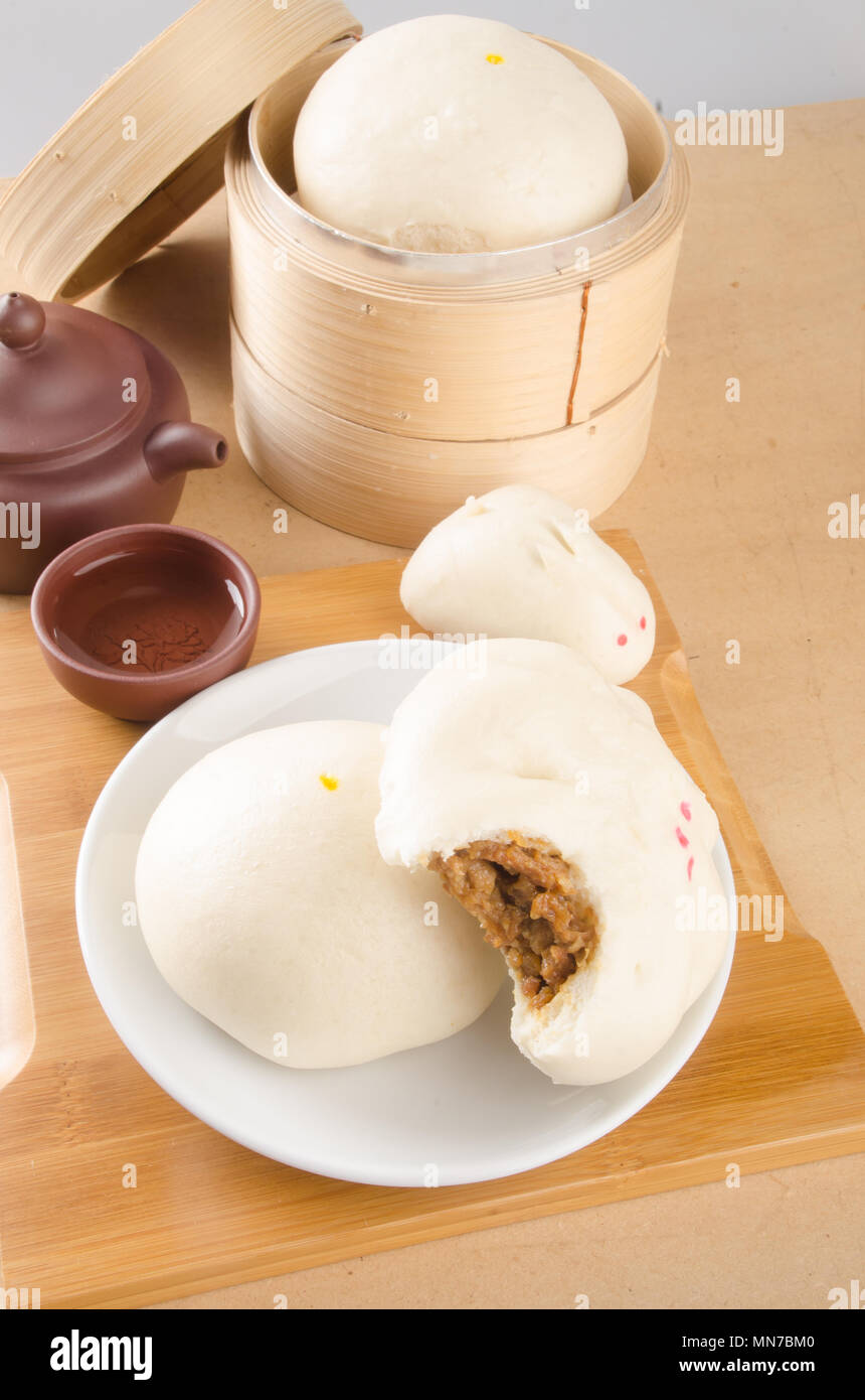 pao or asian buns on a background Stock Photo - Alamy