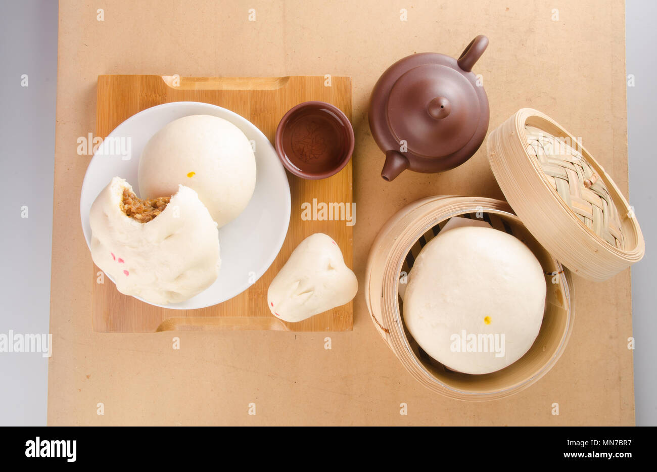 pao or dim sum with chinese tea on background Stock Photo - Alamy