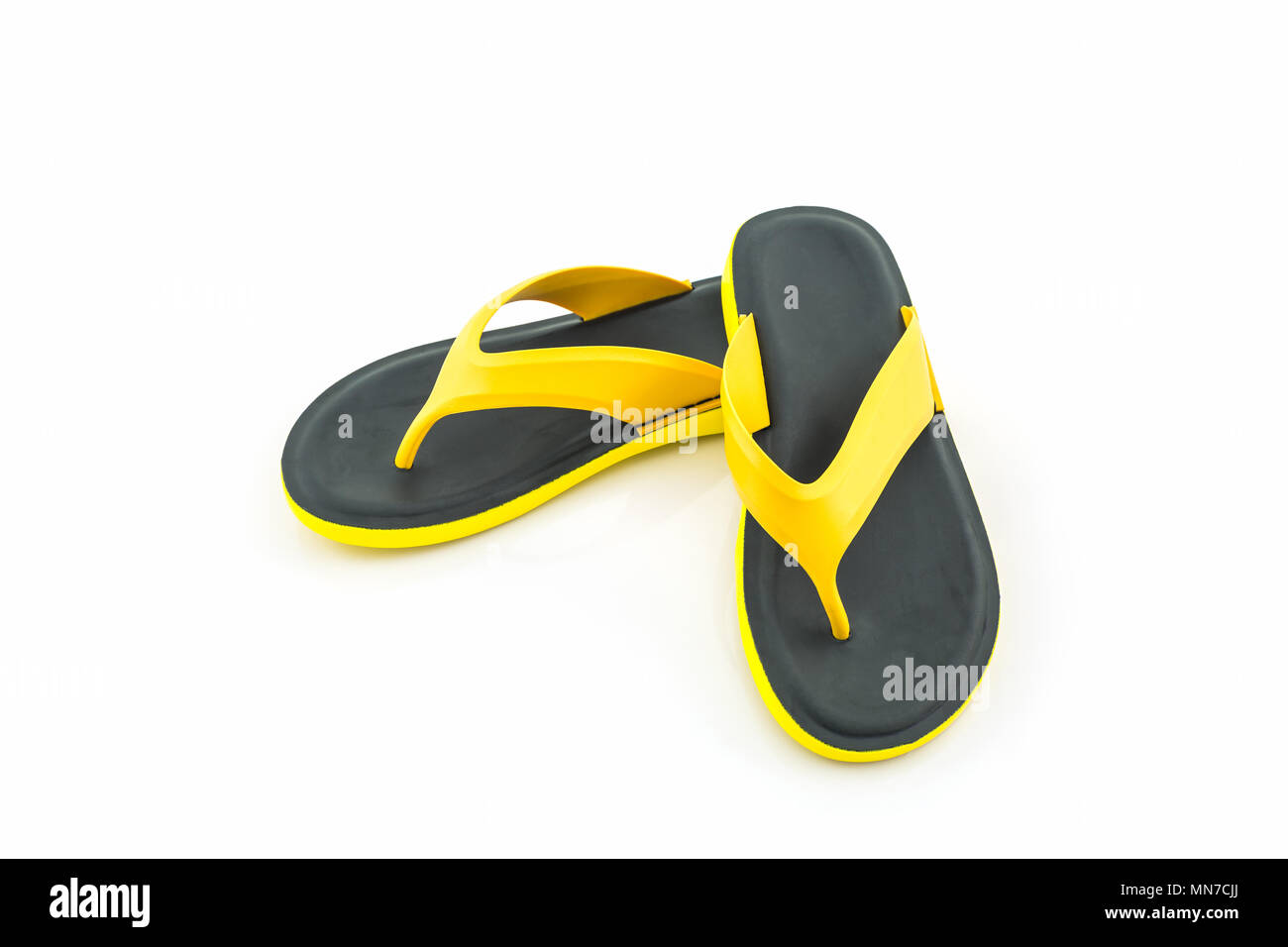 Colorful of Sandals shoes, Yellow and black flip flops on white ...