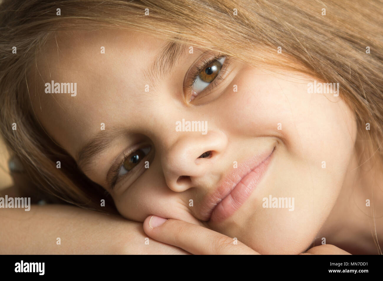 Close-up portrait of a nine-year-old girl Stock Photo - Alamy