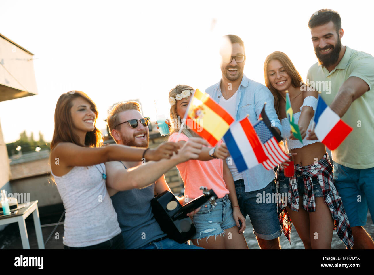 People holding flags hi-res stock photography and images - Alamy
