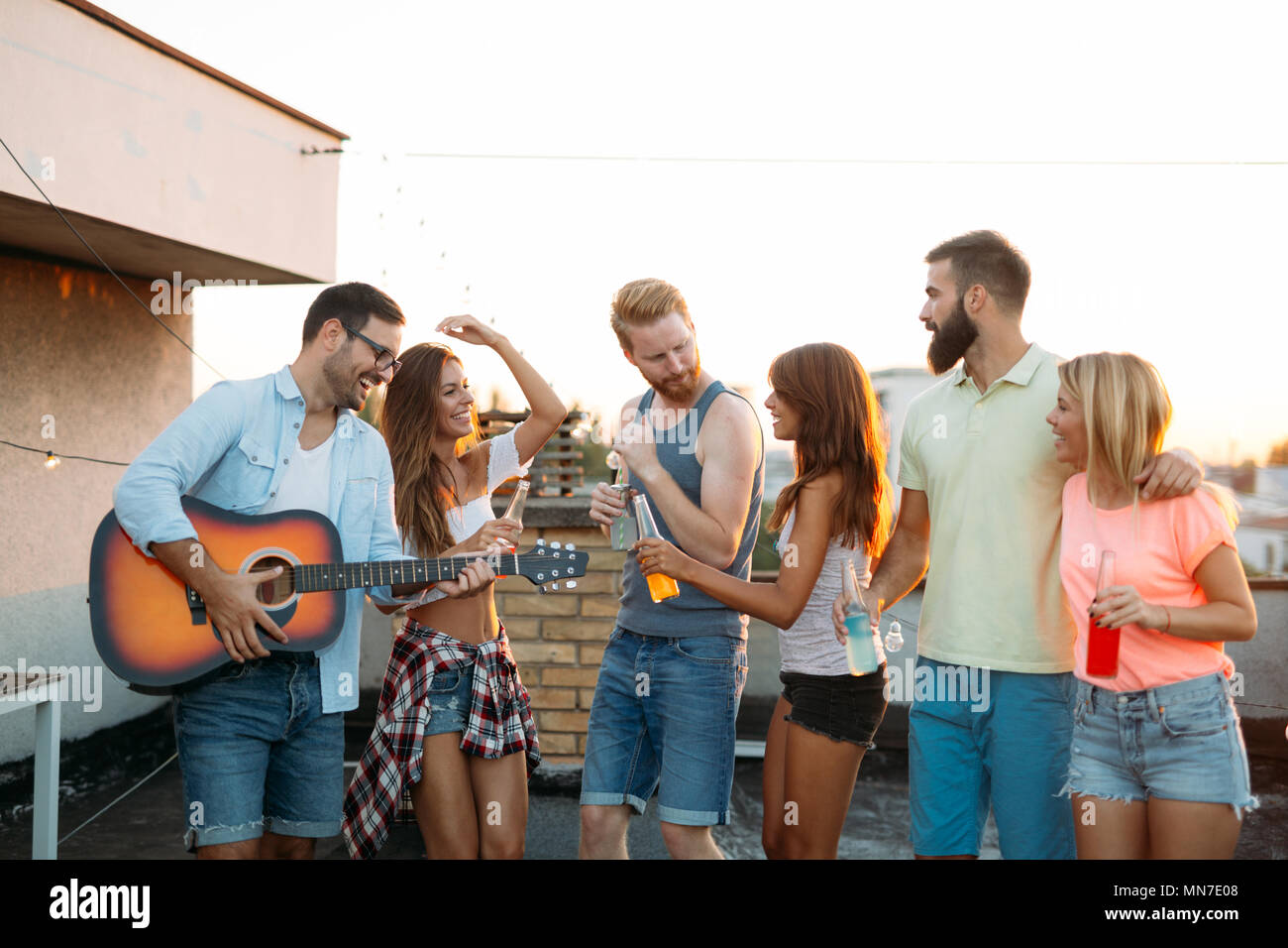Happy friends laughing and smiling outdoors Stock Photo - Alamy