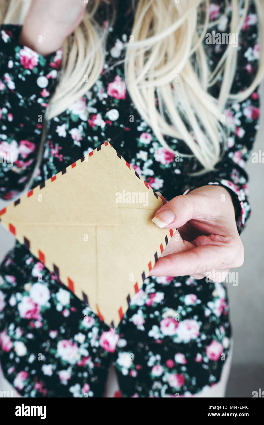 Woman invitation smile envelope hi-res stock photography and images - Alamy