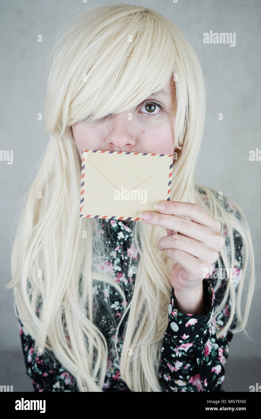 Woman invitation smile envelope hi-res stock photography and images - Alamy