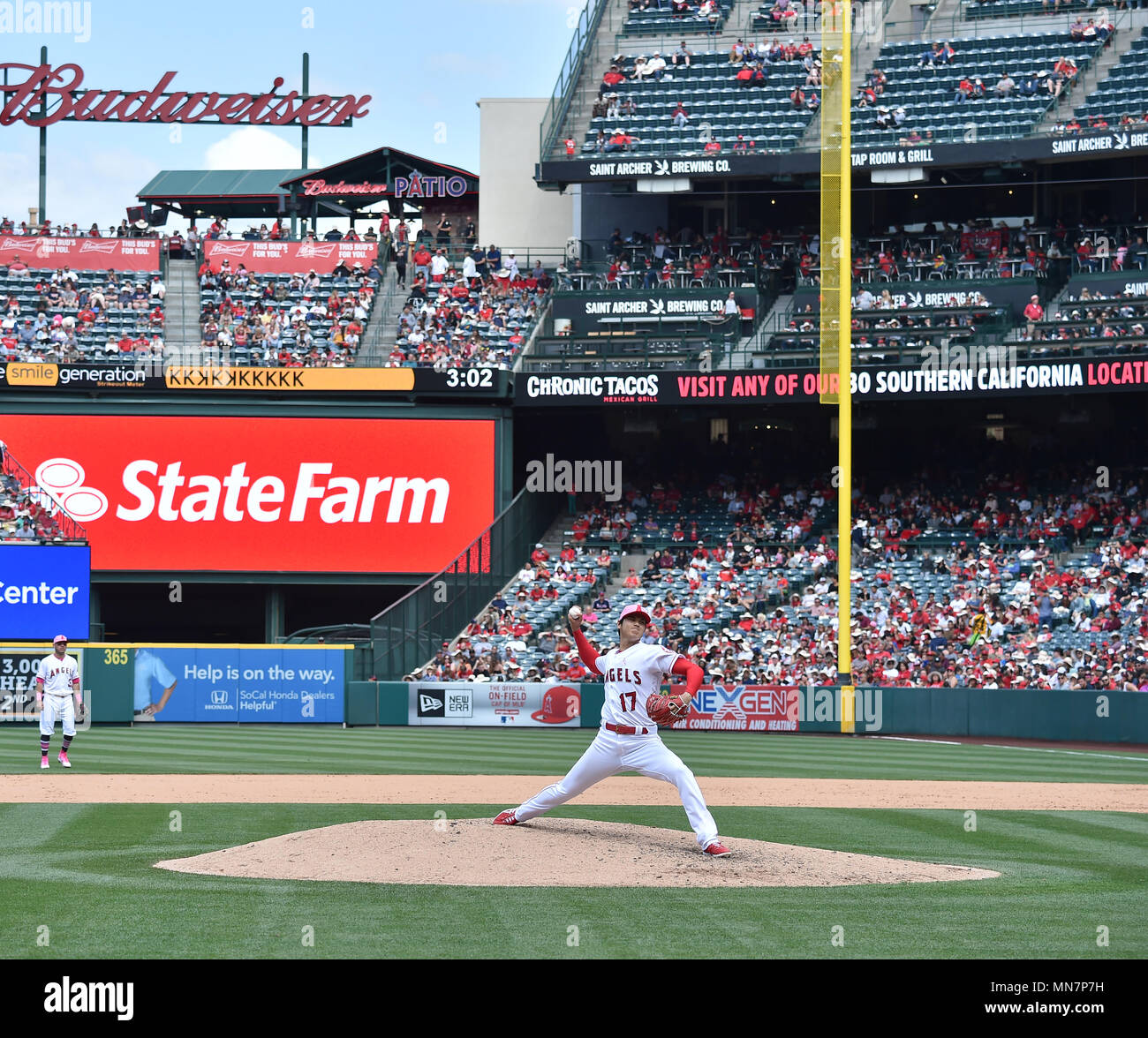 Los Angeles Angels starting pitcher Shohei Ohtani delivers a pitch in ...