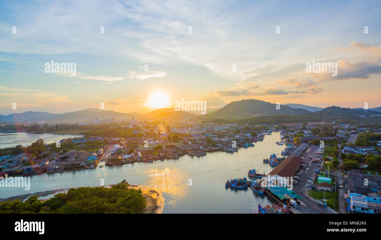 aerial scenery sunset at Siray fishing port. Phuket Fishing Port is the ...
