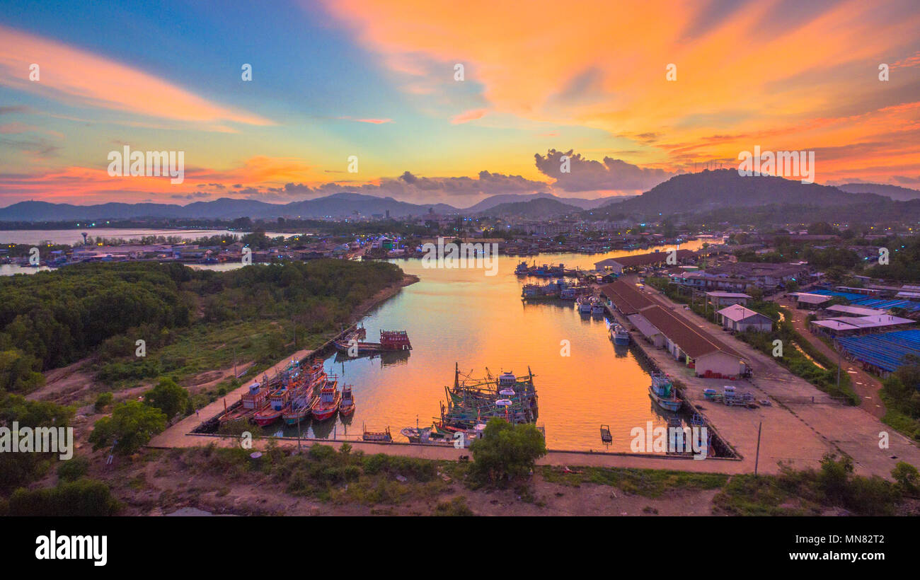 aerial scenery sunset at Siray fishing port. Phuket Fishing Port is the ...