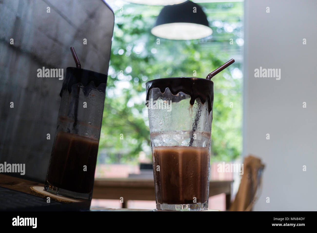 Desk of startup coworking business office with iced drink, stock photo ...