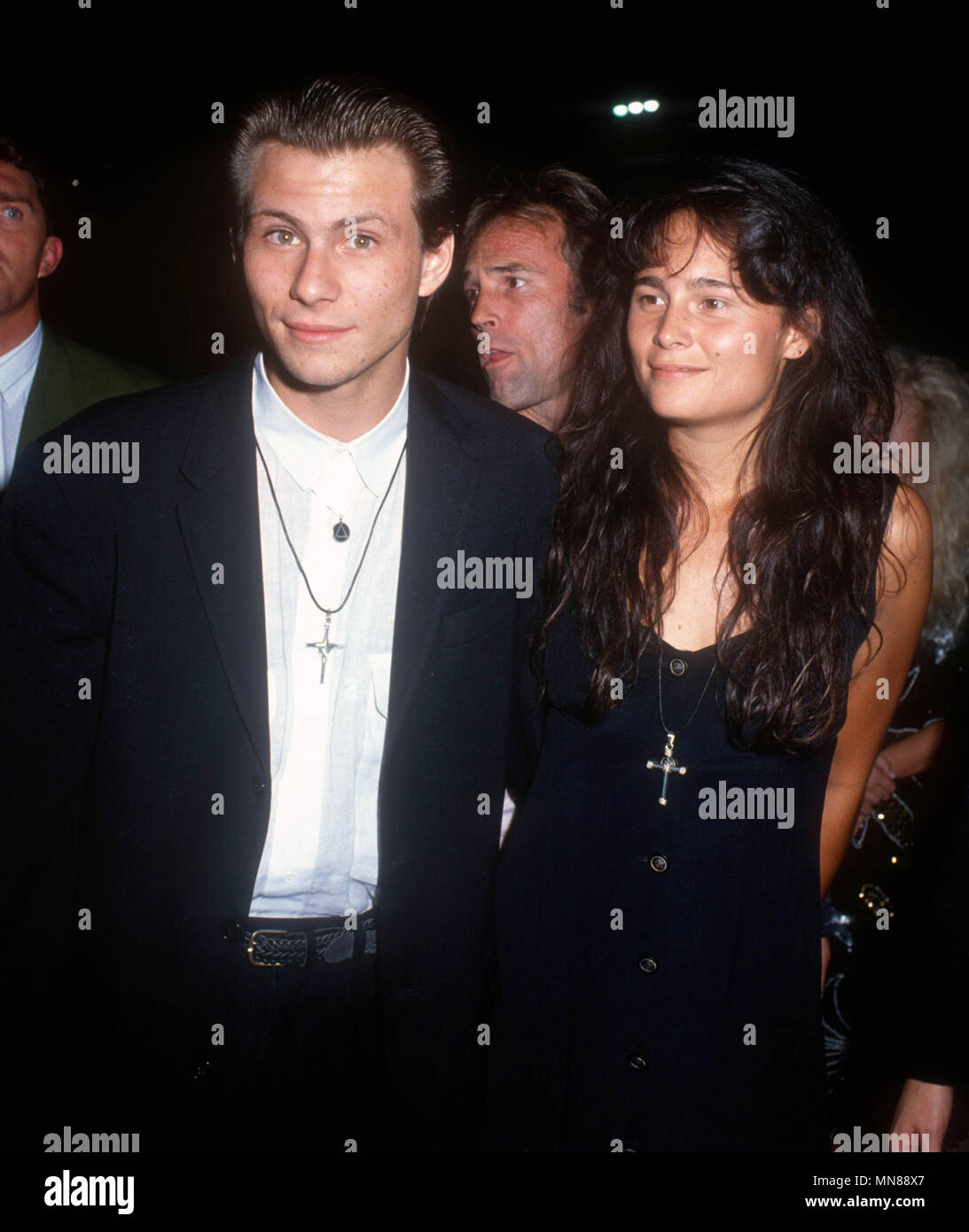 HOLLYWOOD, CA - AUGUST 16: (L-R) Actor Christian Slater and girlfriend ...