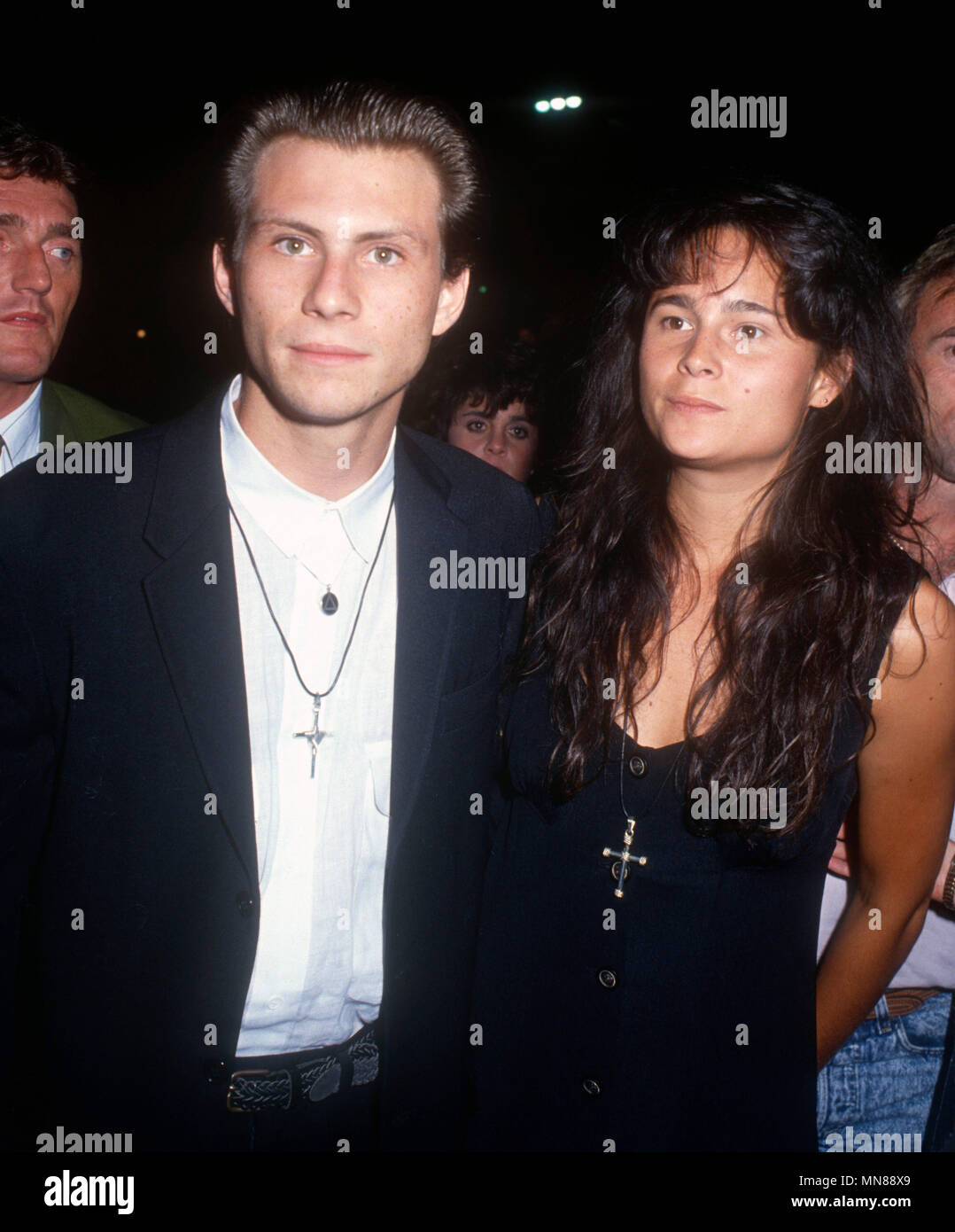 HOLLYWOOD, CA - AUGUST 16: (L-R) Actor Christian Slater and girlfriend ...
