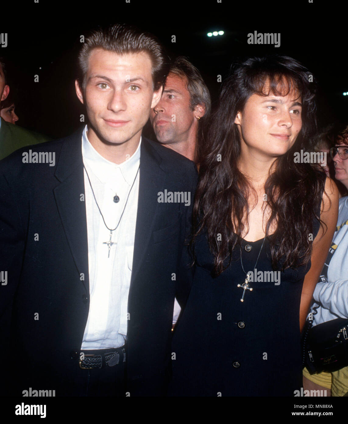 HOLLYWOOD, CA - AUGUST 16: (L-R) Actor Christian Slater and girlfriend ...