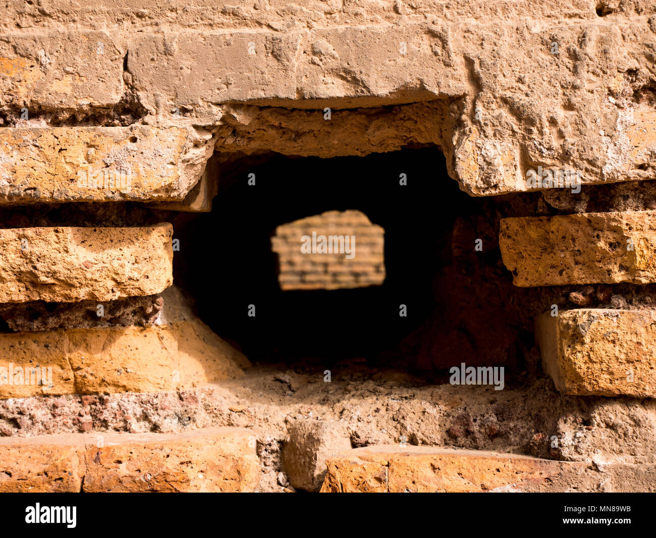 detail on ancient Roman wall with hole, Italy Stock Photo - Alamy