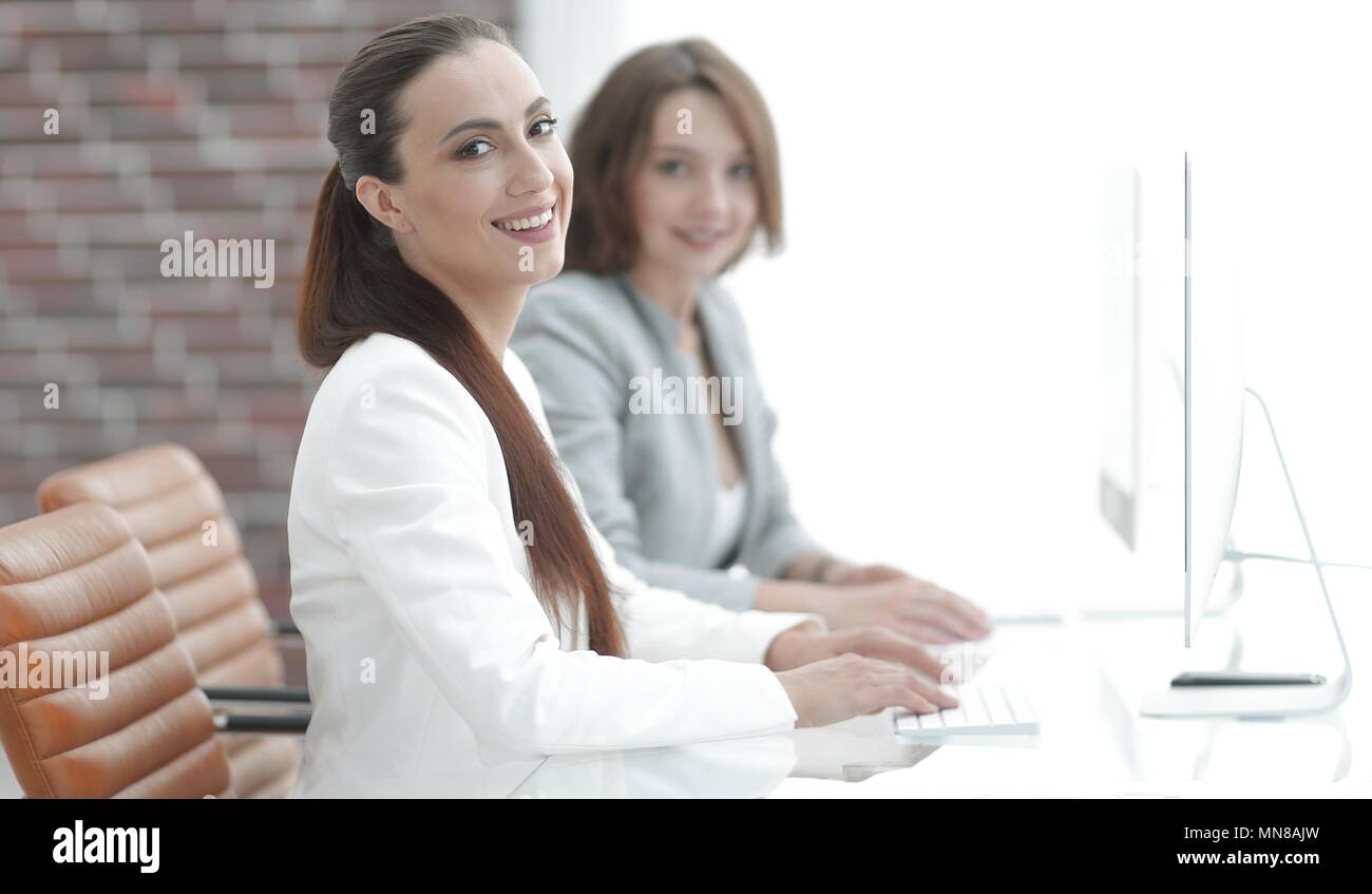 employee of the company working at their workplace Stock Photo - Alamy