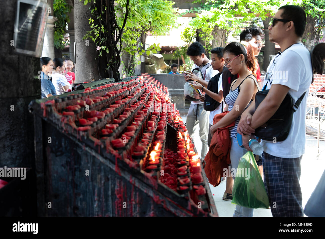 Filipino Praying In Church