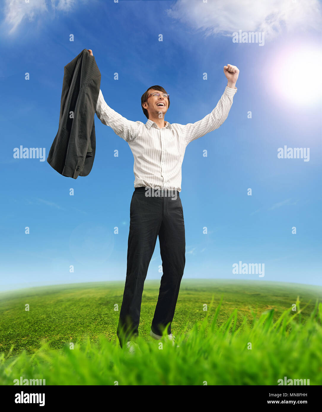 Business concept - young man achieving a new success Stock Photo - Alamy